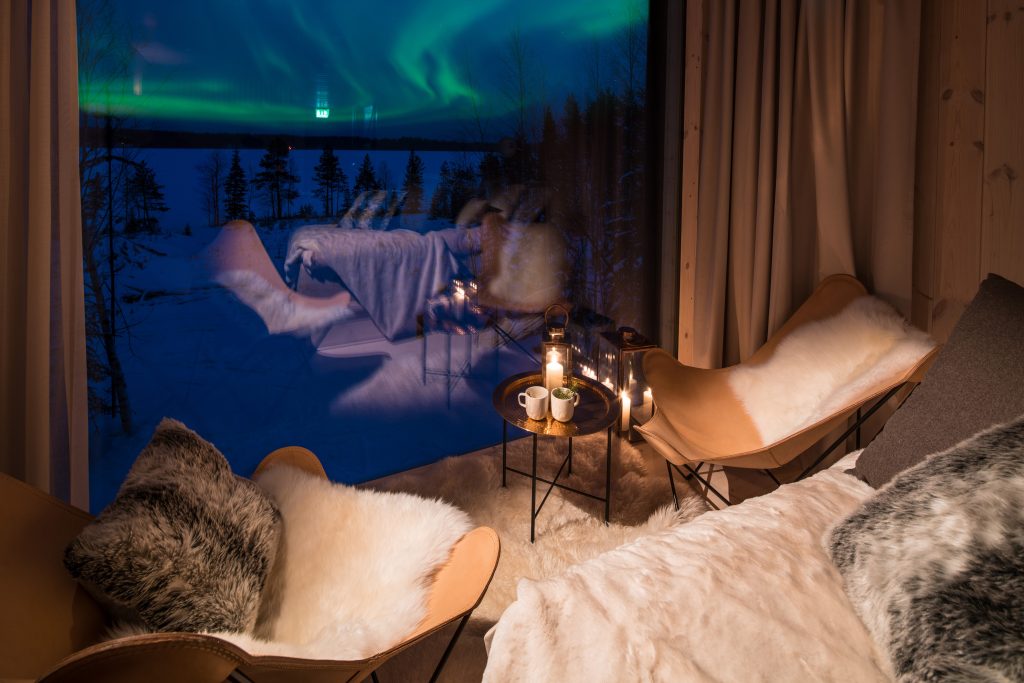 Arctic TreeHouse Hotel Suite indoor with sitting area by the window ...